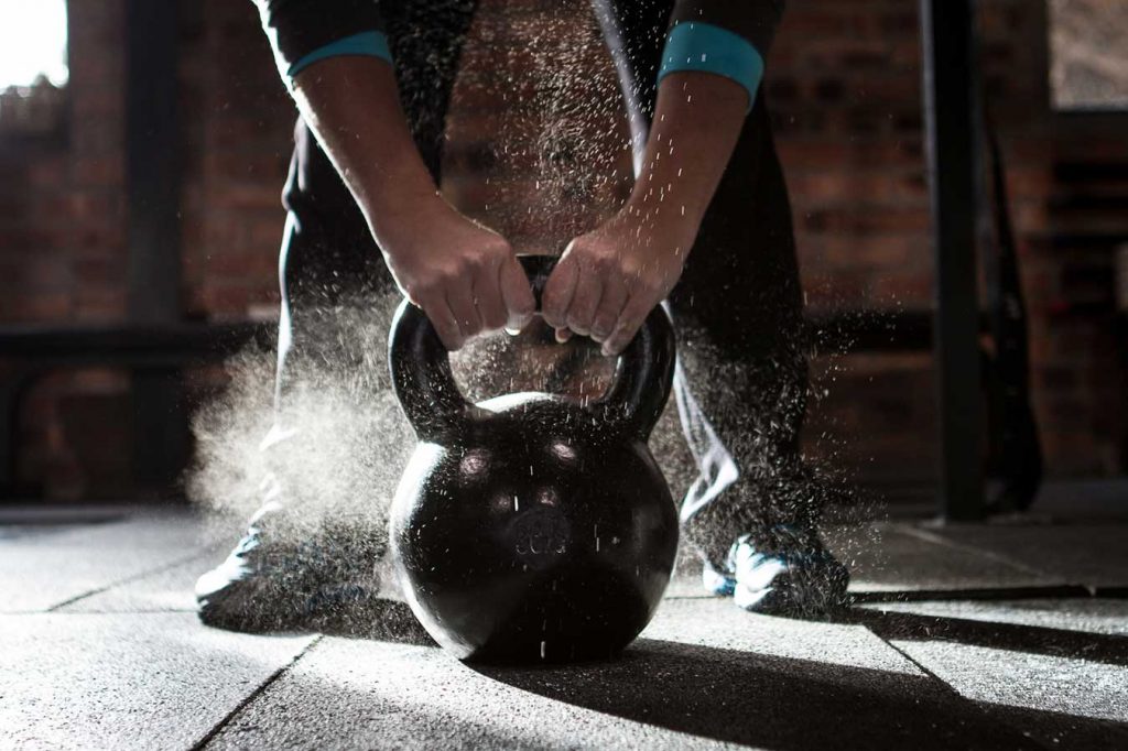 Seated Kettlebell Workout for Your Abs, Legs, and Arms